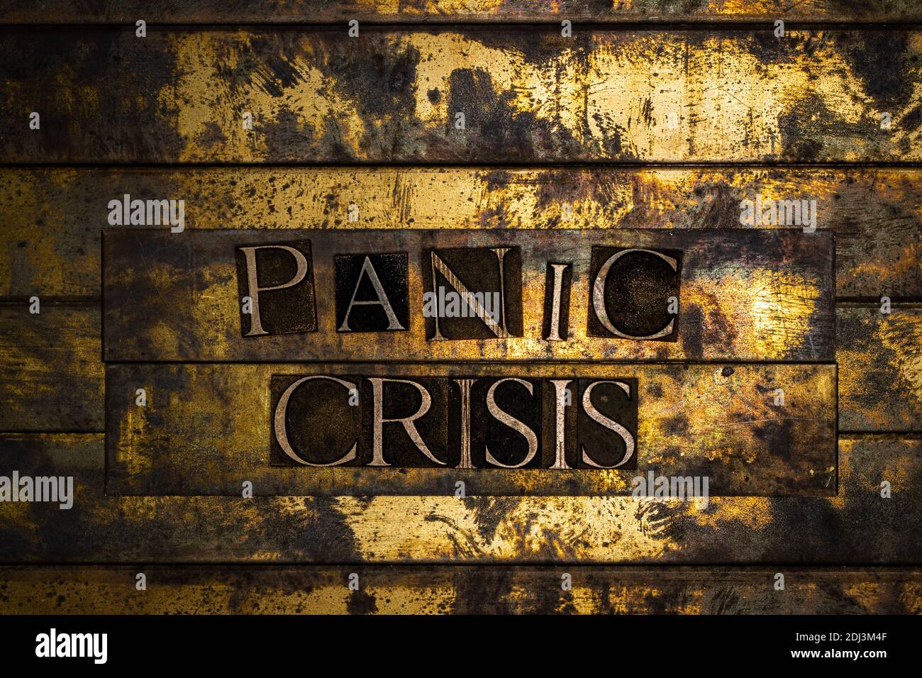 Panic Crisis text on vintage textured bronze grunge copper and gold ...
