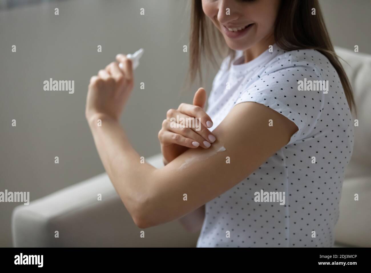 Woman applying cream arm close up hi-res stock photography and images ...