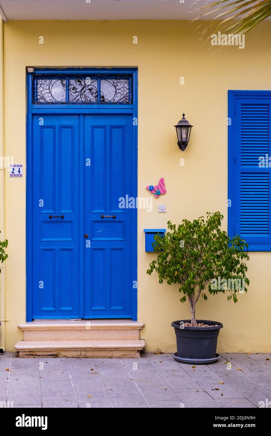 Blue door and window of a yellow traditional house in old Nicosia ...