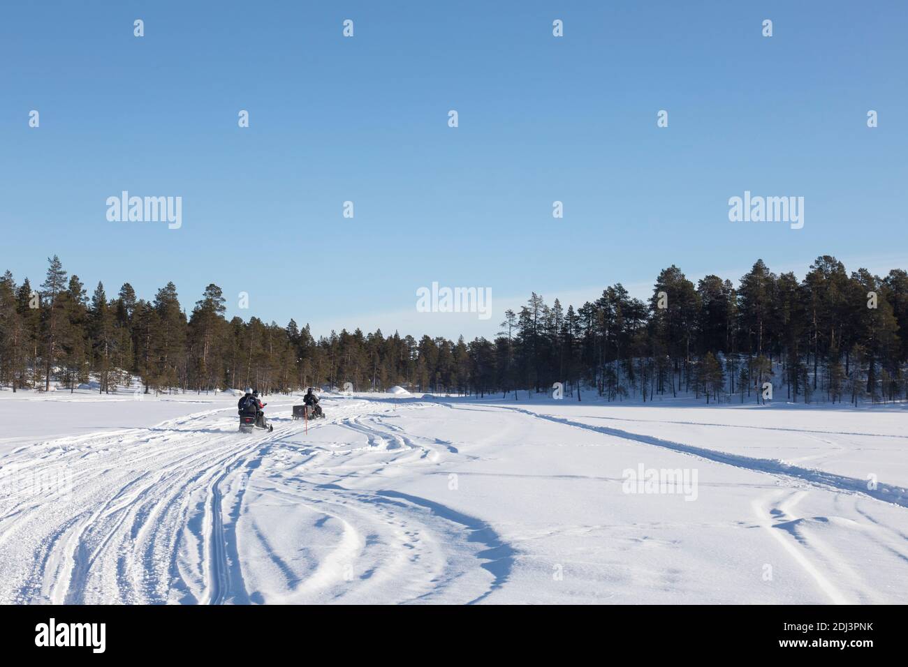 Inari, Lapland, Finland - March 2, 2020: snowmobile touristic tour on ...