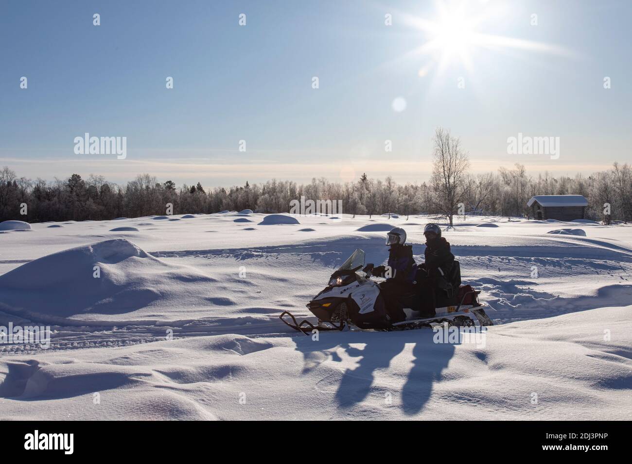 Inari, Lapland, Finland - March 2, 2020: snowmobile touristic tour on ...