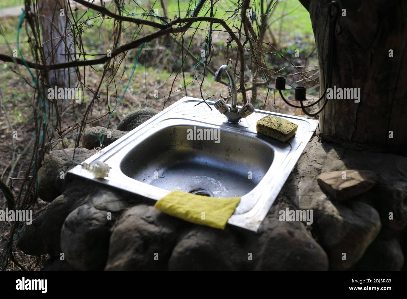 Old steel kitchen sink in the park Stock Photo - Alamy
