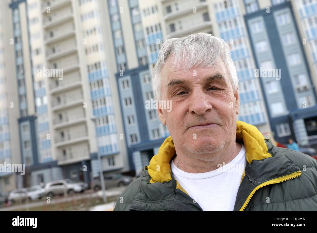 Portrait of man on new building background Stock Photo - Alamy