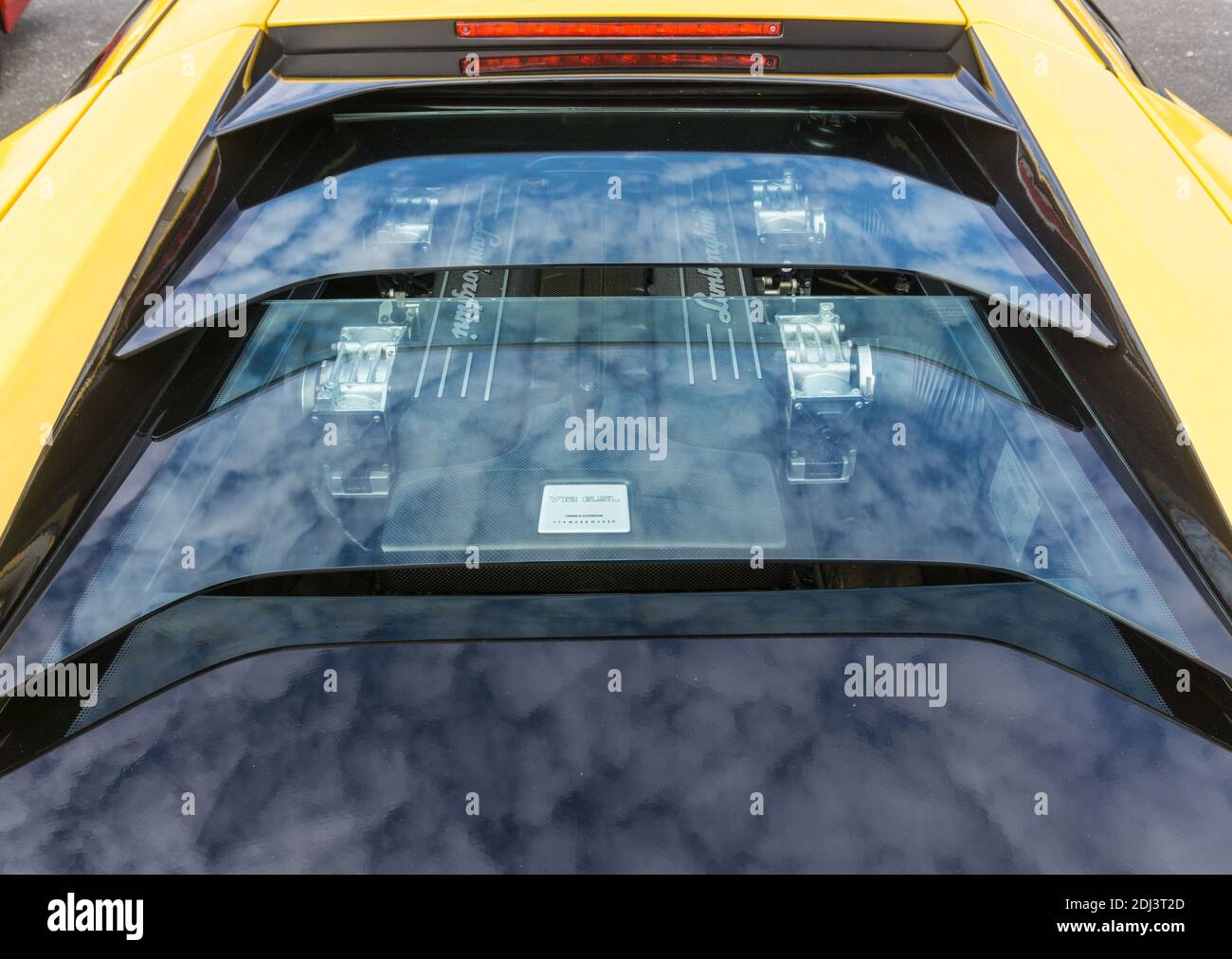 Close up detail of the engine cover and rear window of a yellow ...