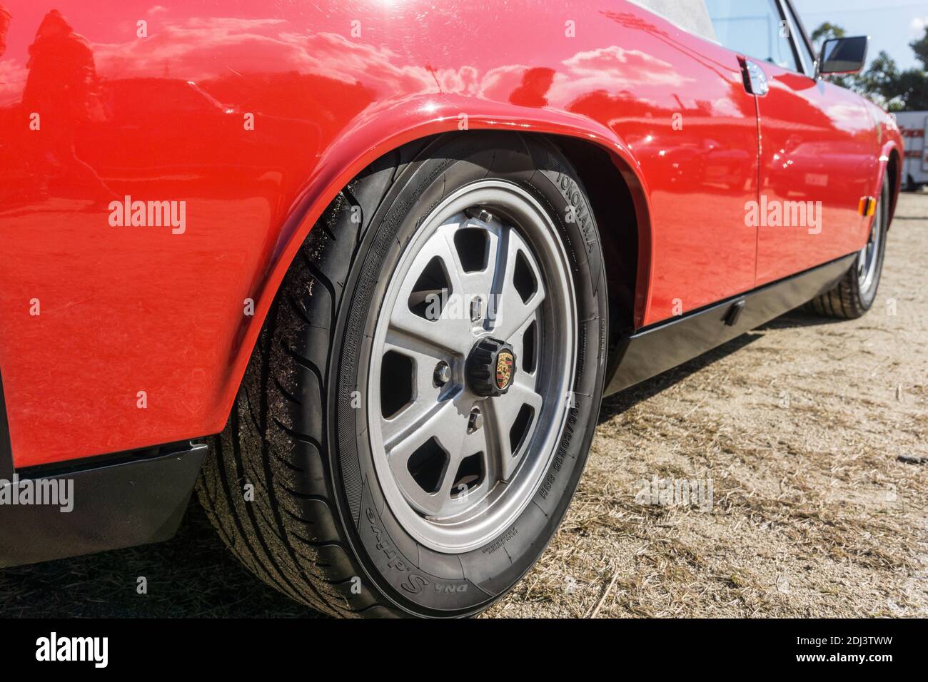 Close up detail of the rear wheel, tyre and arch of a red Porsche 914 ...