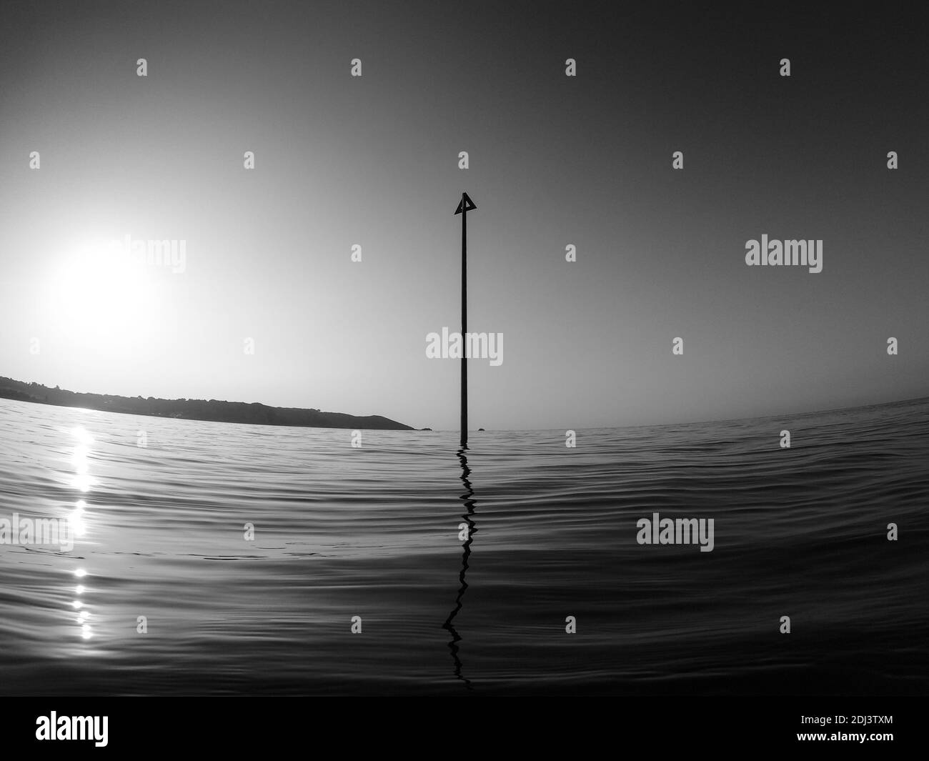 Smooth sea swim around a reef marker Stock Photo - Alamy