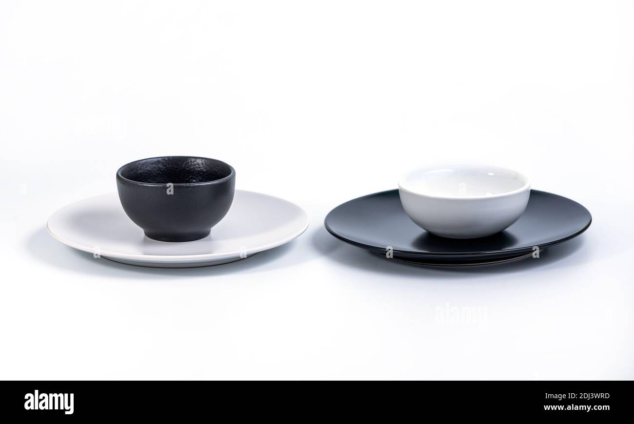 Black and White Bowls in White and Black Plates isolated on white ...