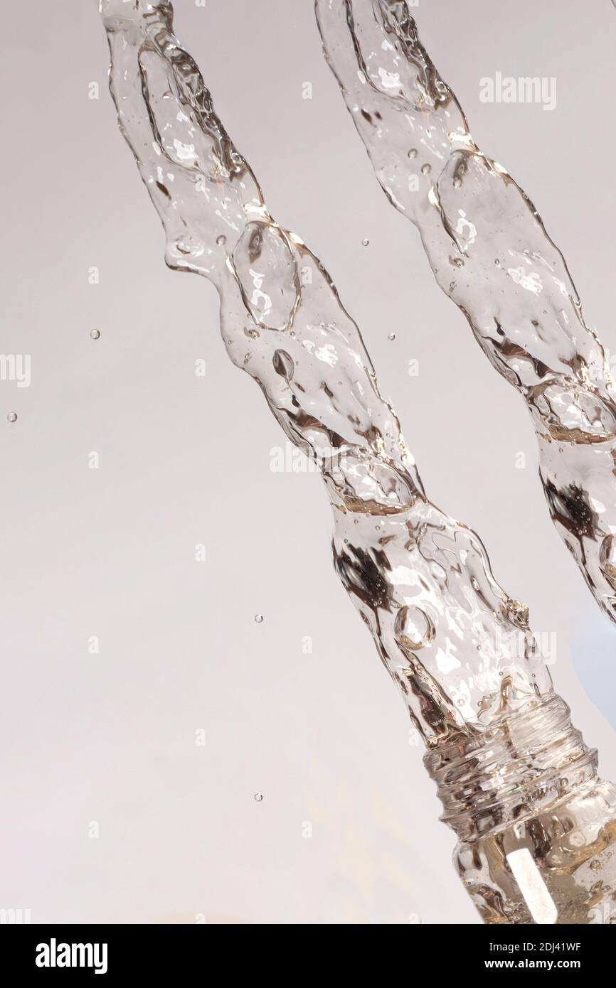 Drinking water splash on bottle Stock Photo - Alamy