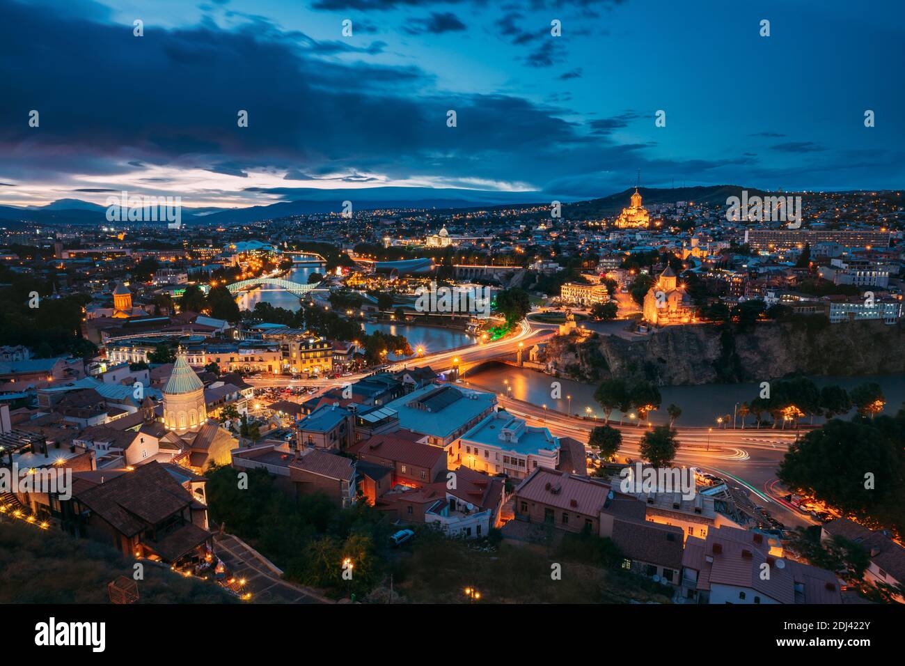 Tbilisi, Georgia. Evening Night View Of Georgian Capital Skyline ...