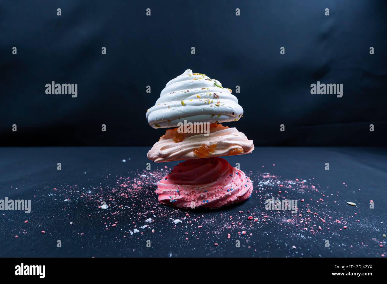 A popular French meringue dessert on a black background. Closeup Stock ...