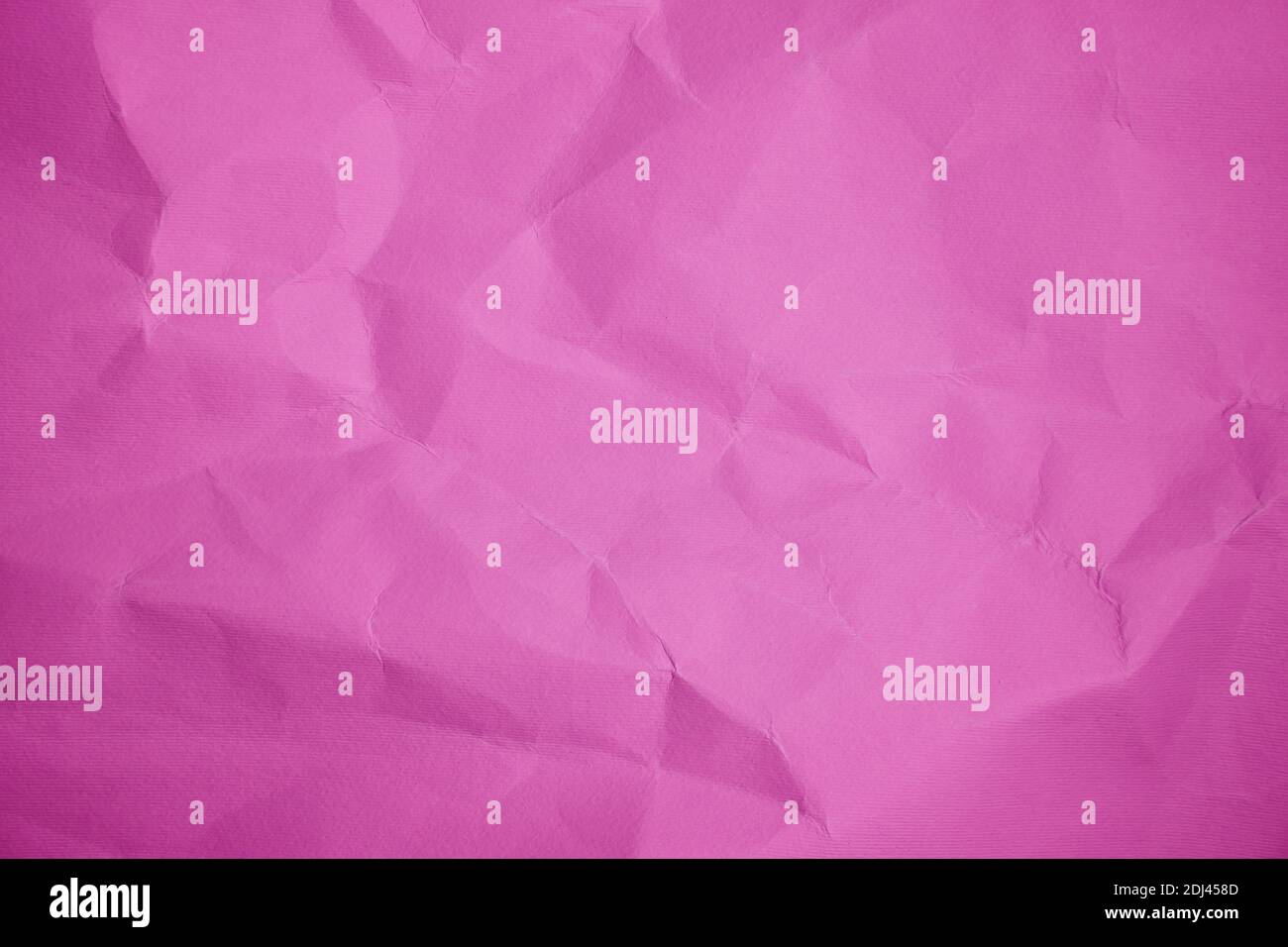 Magenta Sheet crumpled paper color background Close up Copy space for ...