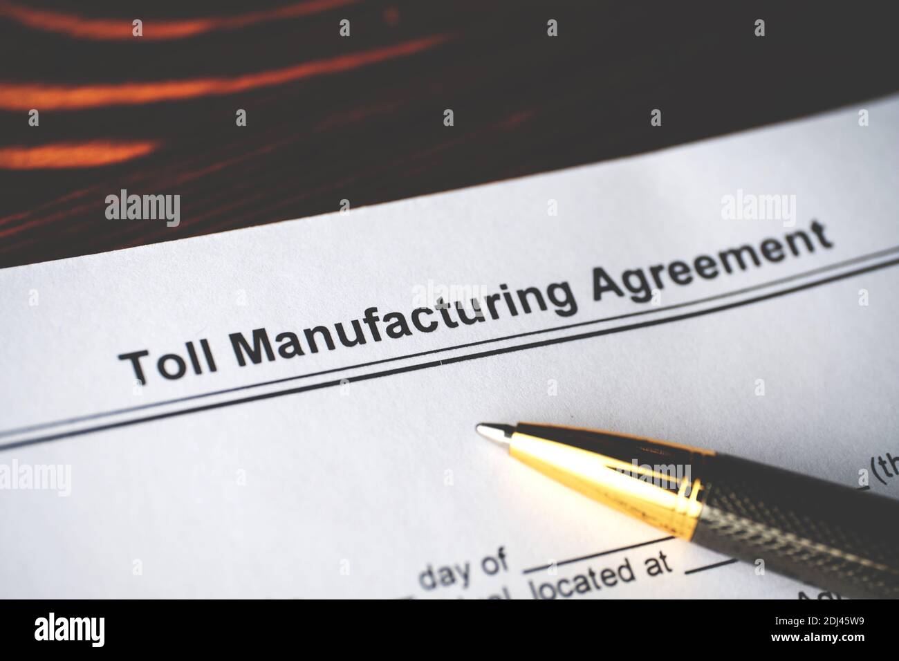 Legal document Toll Manufacturing Agreement on paper close up Stock ...