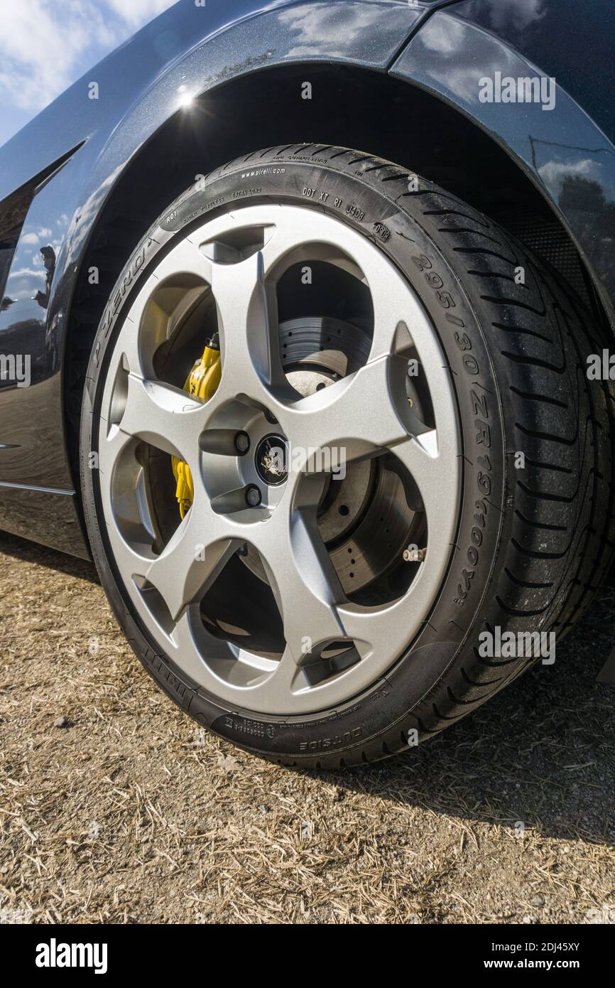 Close up detail of the rear wheel and arch on a metallic black first ...