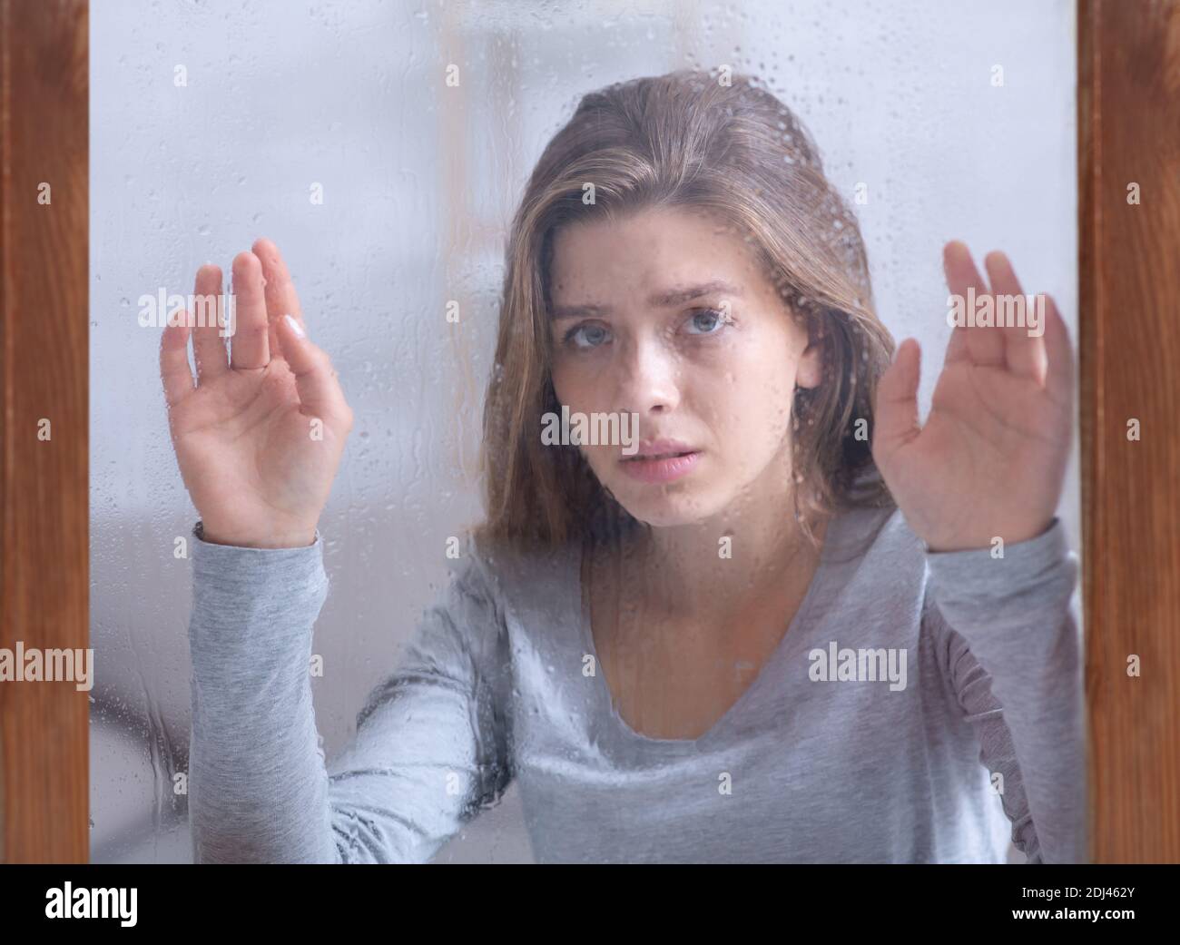 Beautiful millennial woman feeling sad and lonely because of bad ...