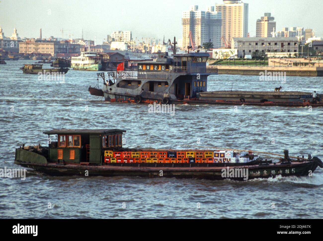 Barges on the Huangpo River, opposite the Bund, Shanghai, China June ...