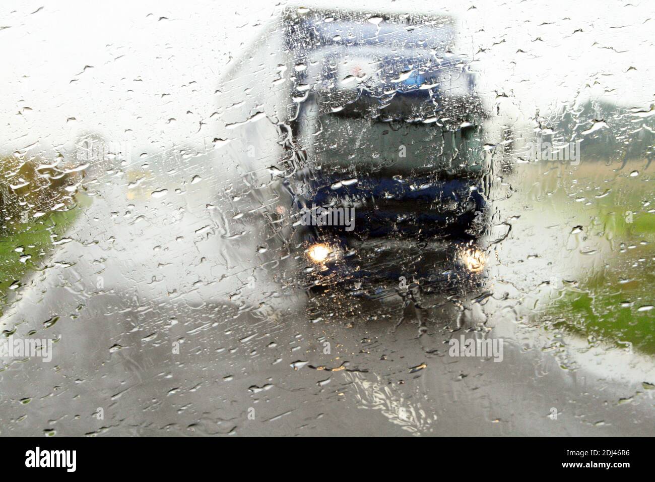 Lorry Driving In Bad Weather Stock Photo - Alamy