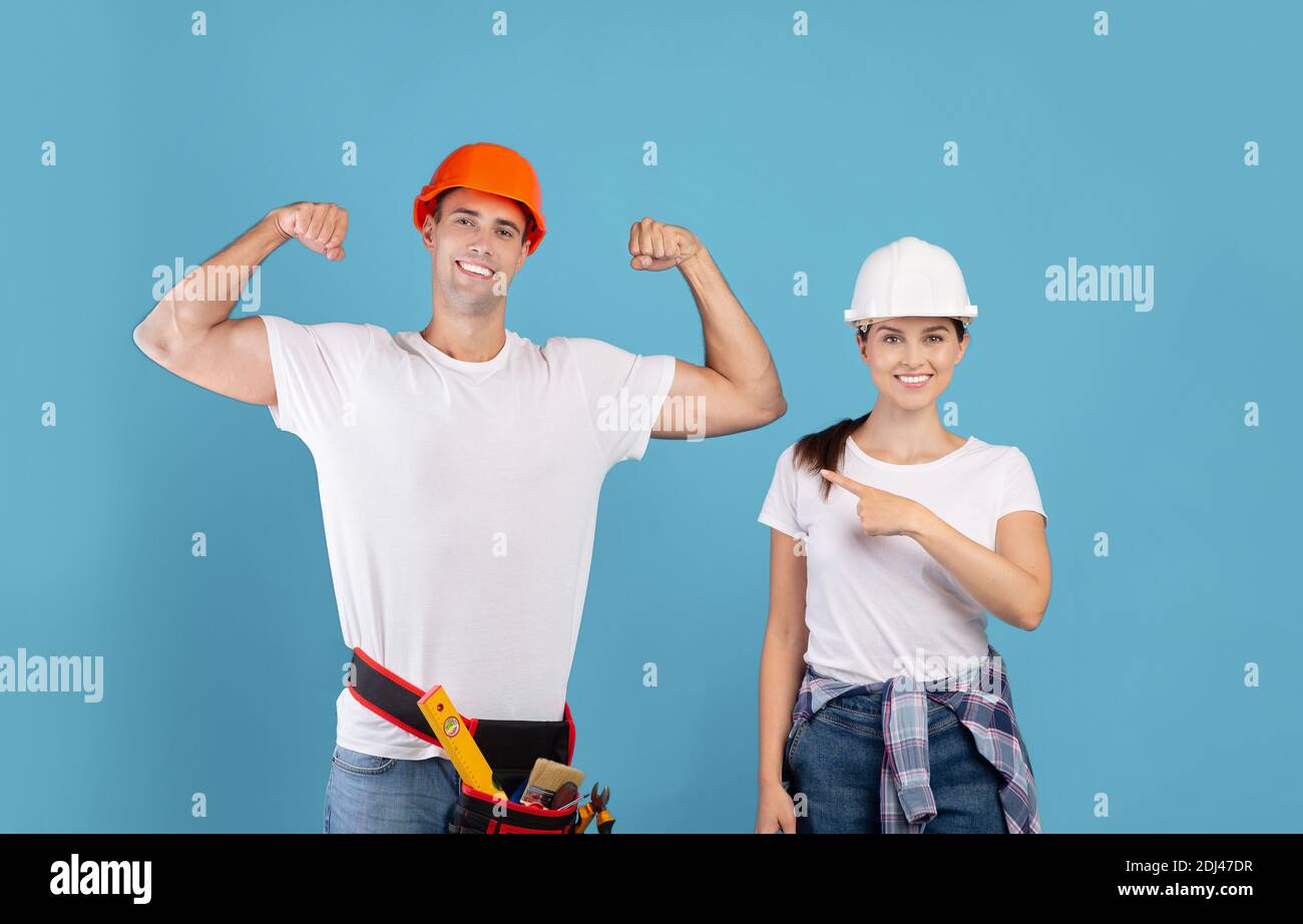 DIY Renovation. Woman Pointing At Strong Boyfriend While They Doing ...