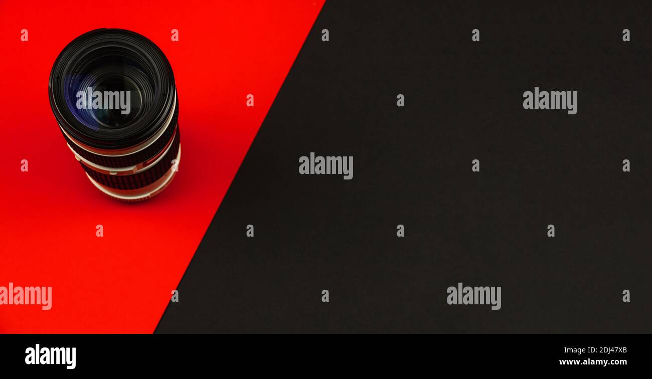 DSLR camera concept, banner with lens on plain background with place ...