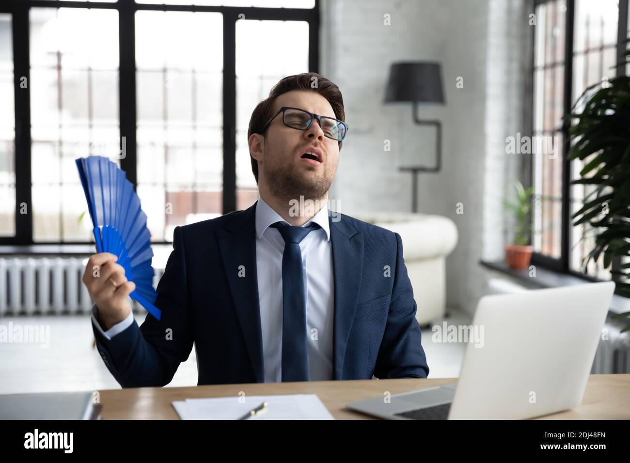 Too hot summer man suit hi-res stock photography and images - Alamy
