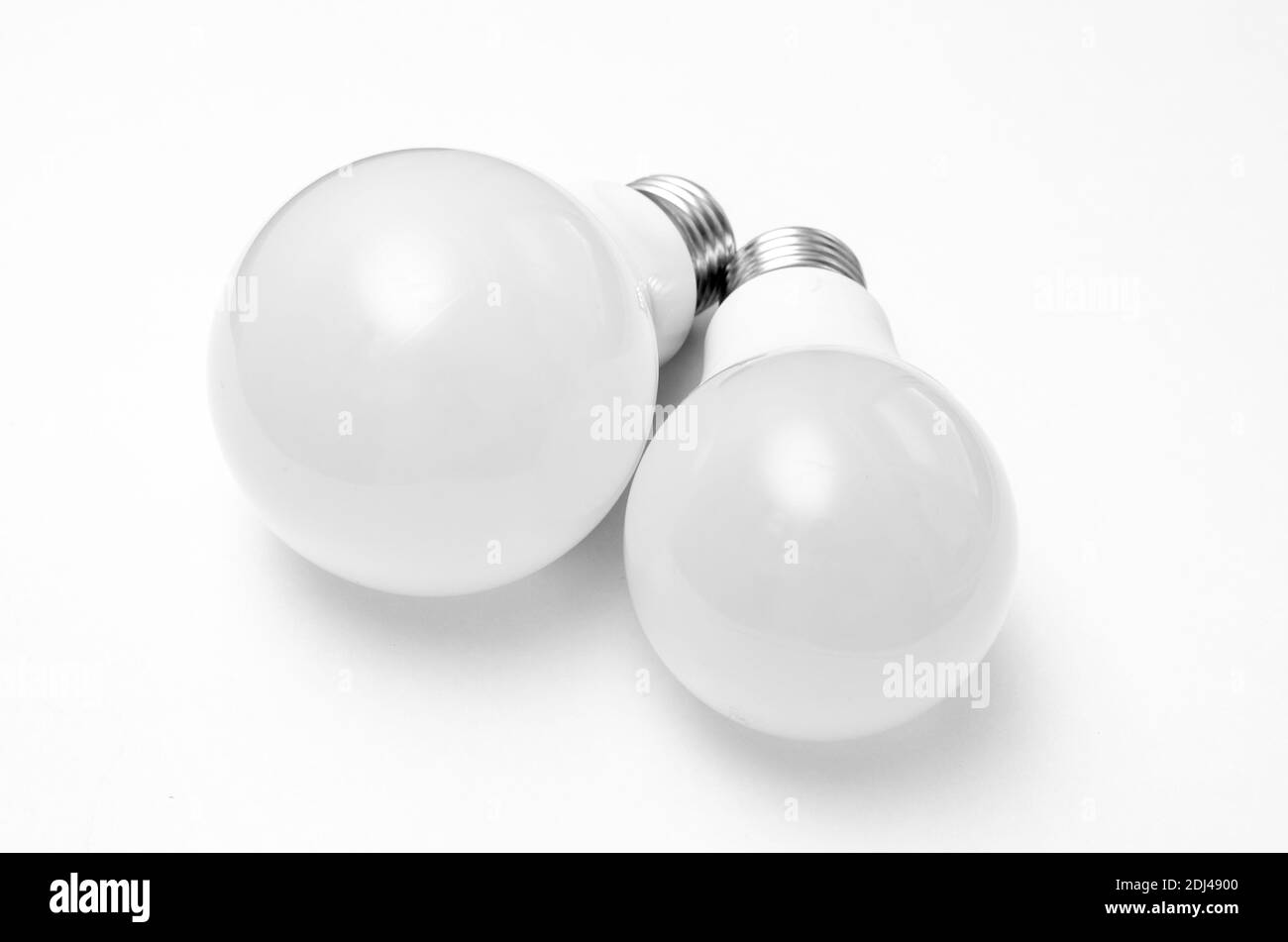 Pair of plastic led bulbs representing the new lighting technology ...