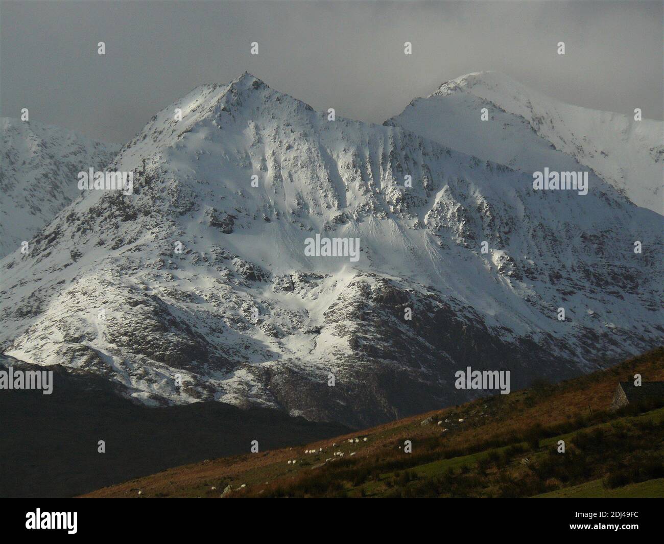 Crib Goch, Crib y Ddysgl and Garnedd Ugain in heavy snow. Snowdonia ...