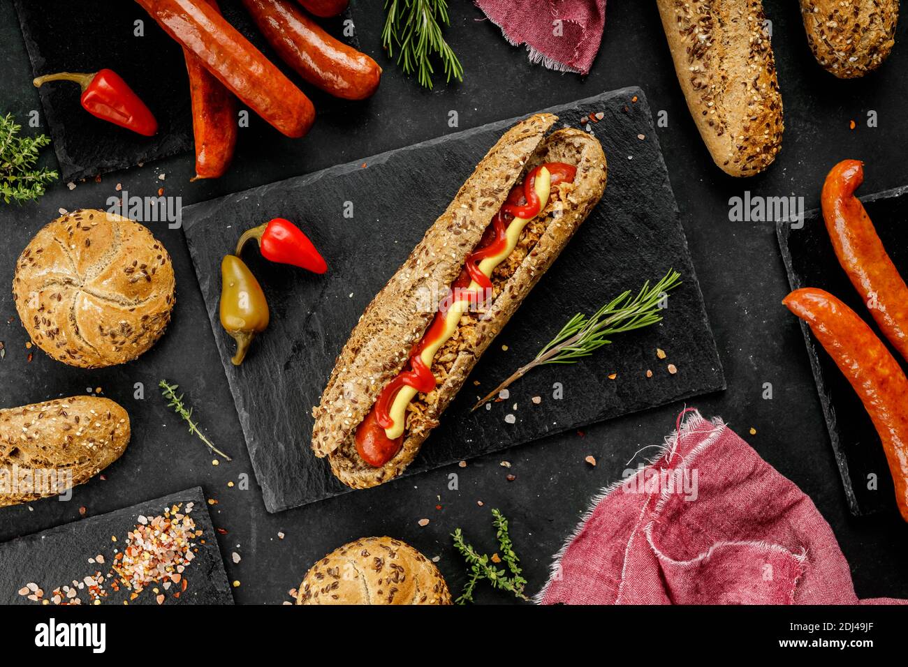 Flat lay composition of delicious hot dogs and sandwiches with ...