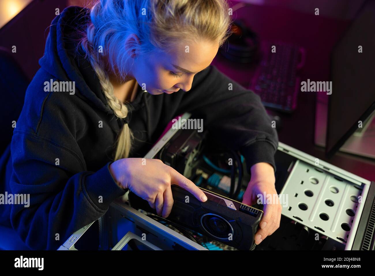 E-sport Gamer Girl Installing New GPU Video Card in Her Gaming PC Stock ...