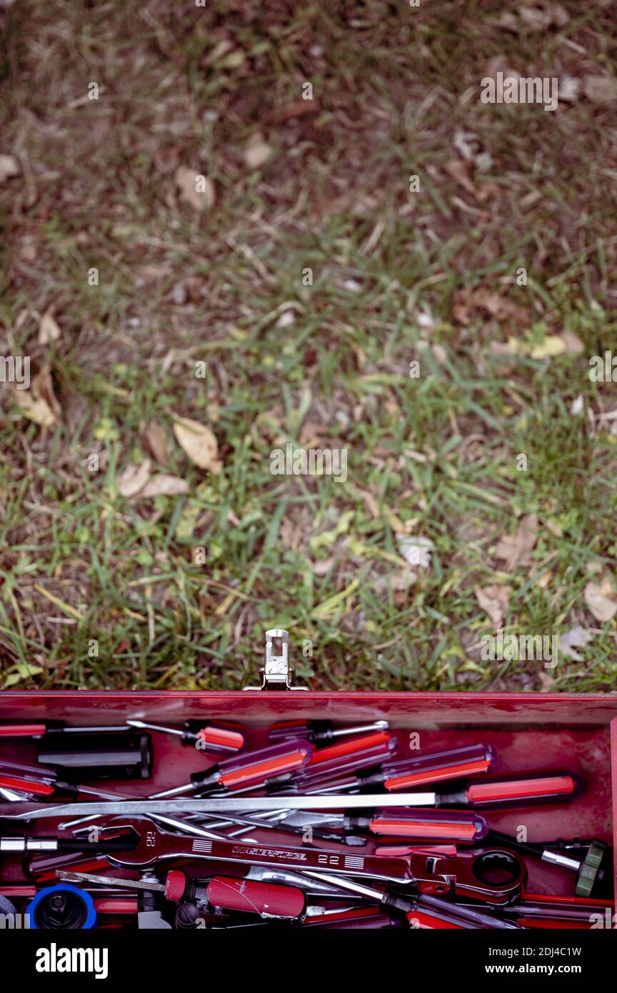 A vertical shot of some tools in the toolbox Stock Photo - Alamy