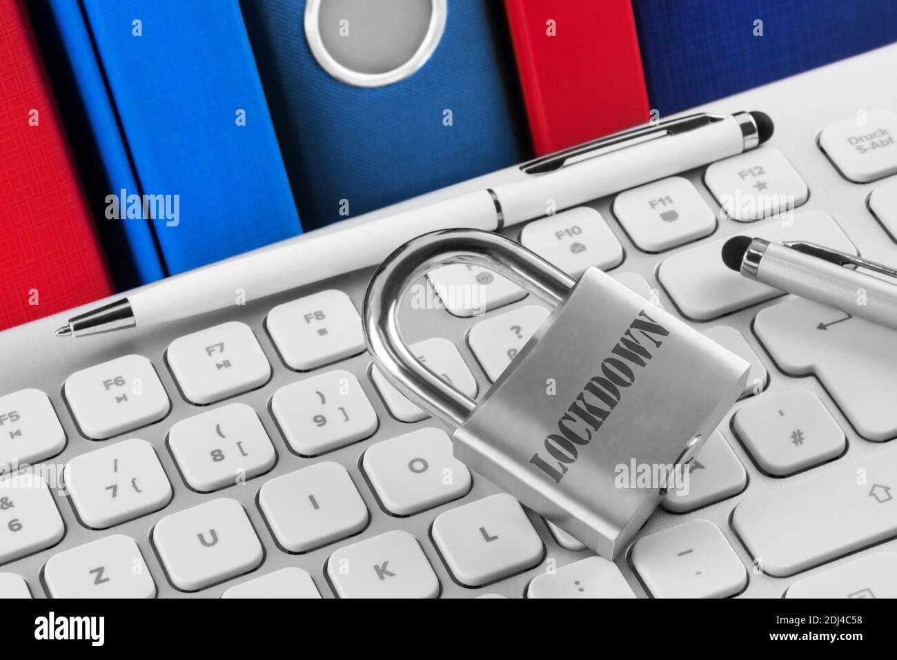 Lockdown und PC keyboard with lock Stock Photo - Alamy
