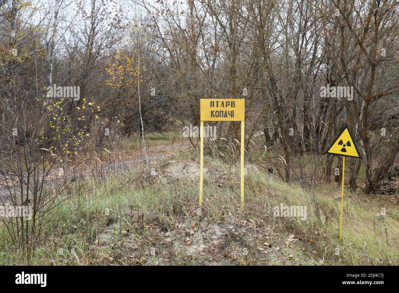 An hazard sign in the Chernobyl exclusion area near the ghost city of ...