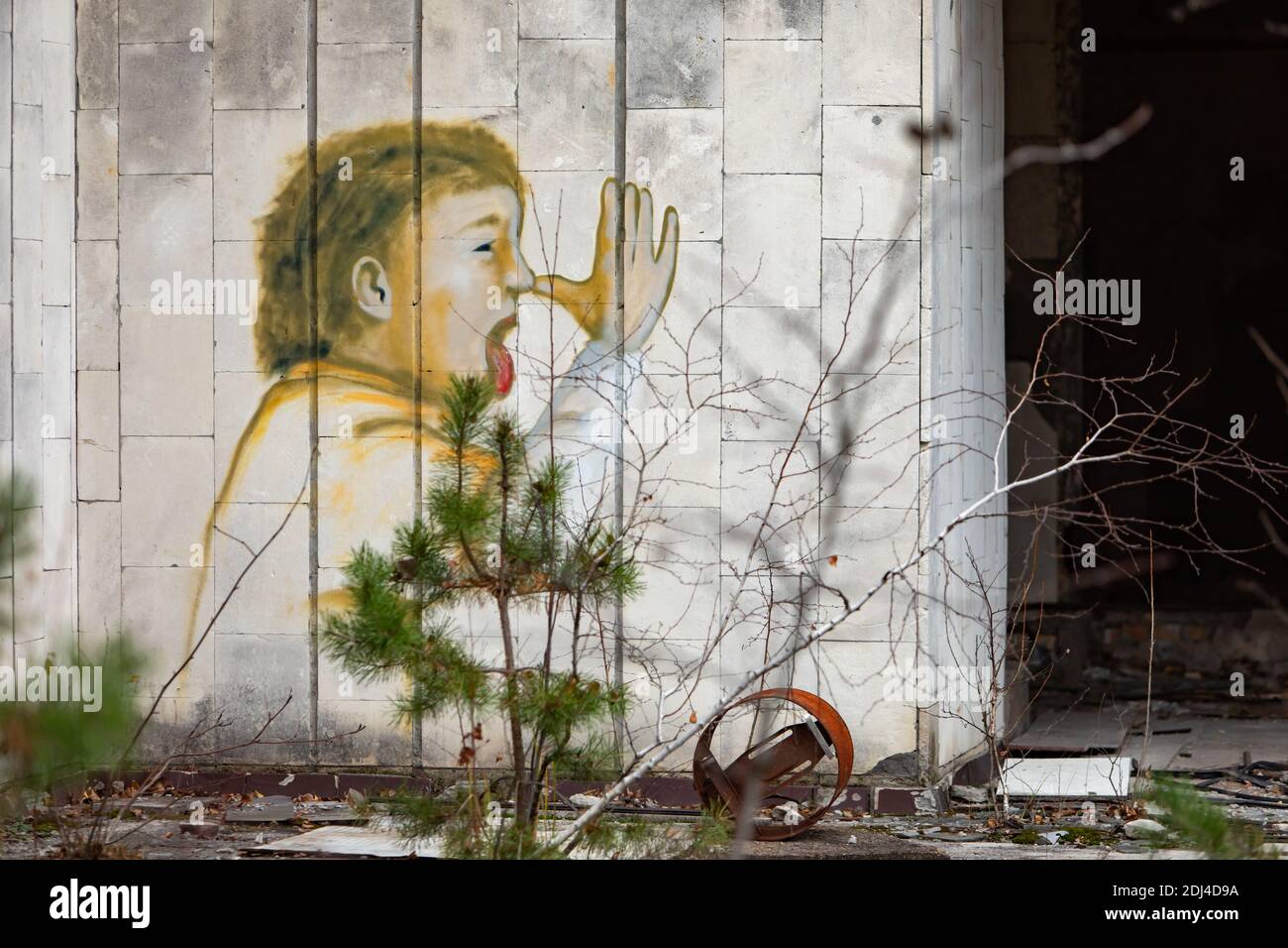 Pripyat, Ukraine - November 3, 2019: mural of a blond kid on a wall of ...