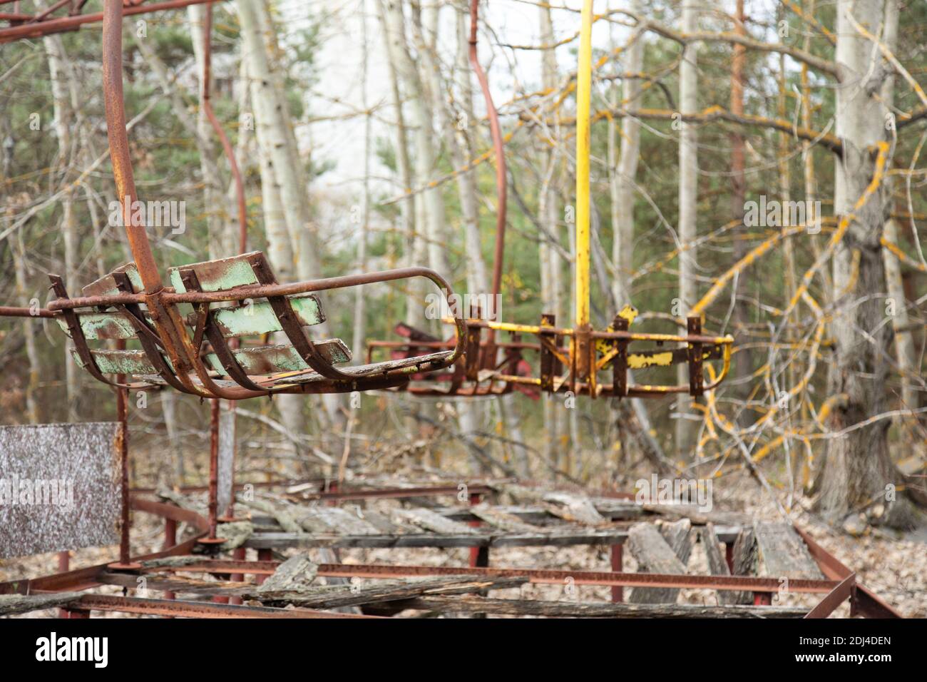 A rusty carousel in the abandoned luna park of Pripyat, a ghost city in ...