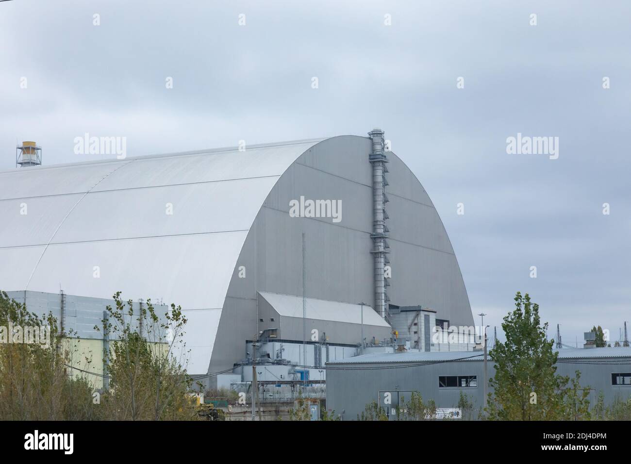 The nuclear power plant, where a protective shelter covers the reactor ...