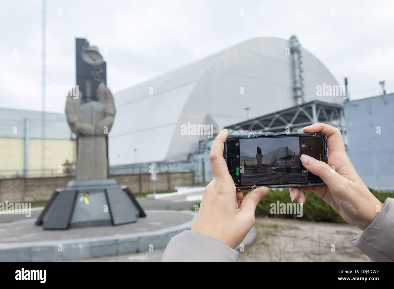 Chernobyl, Ukraine - November 3, 2019: A girl takes a photo to the ...