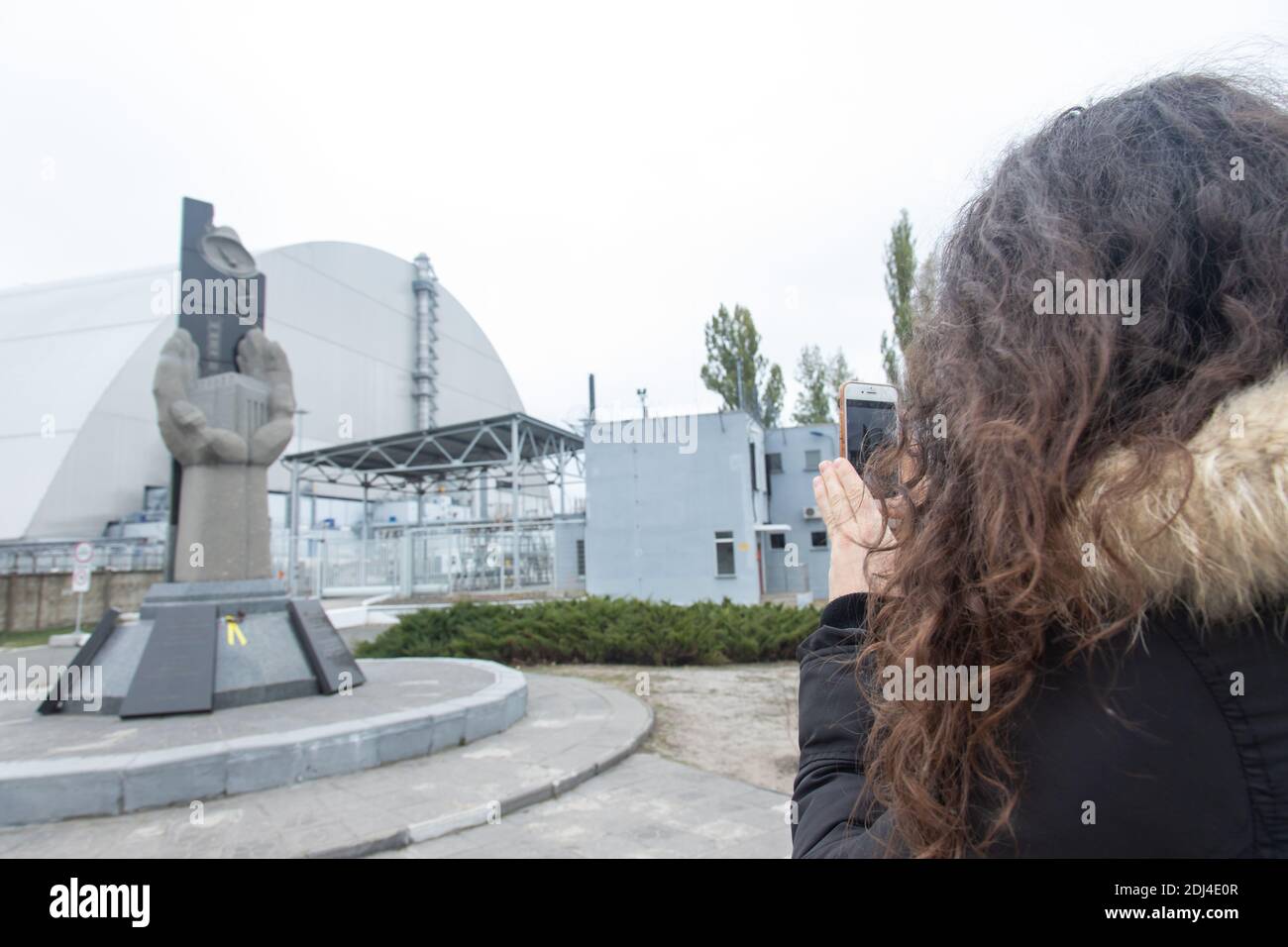 Chernobyl, Ukraine - November 3, 2019: A girl takes a photo to the ...