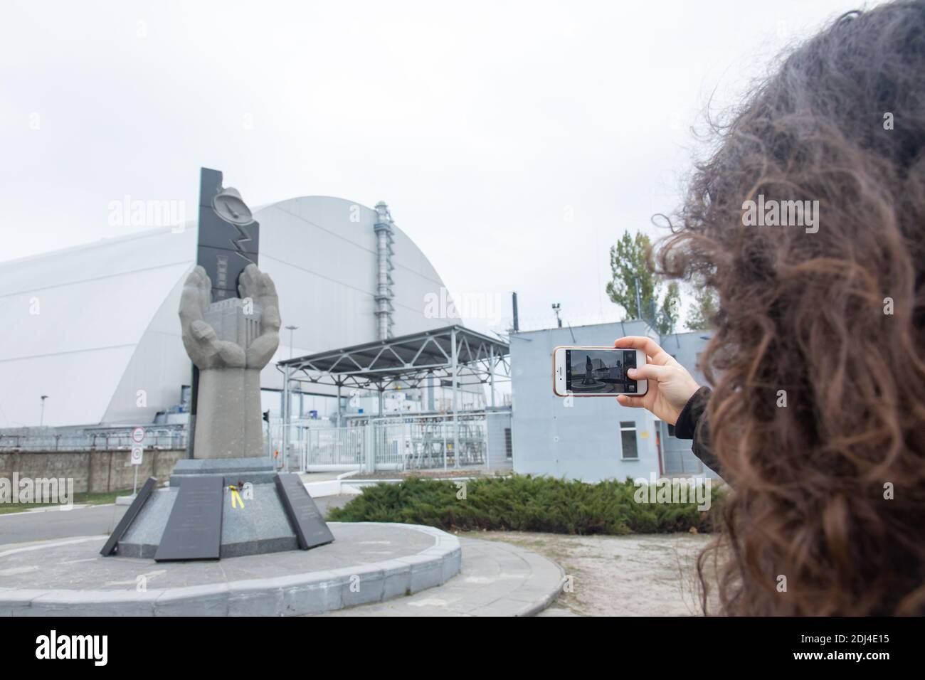 Chernobyl, Ukraine - November 3, 2019: A girl takes a photo to the ...