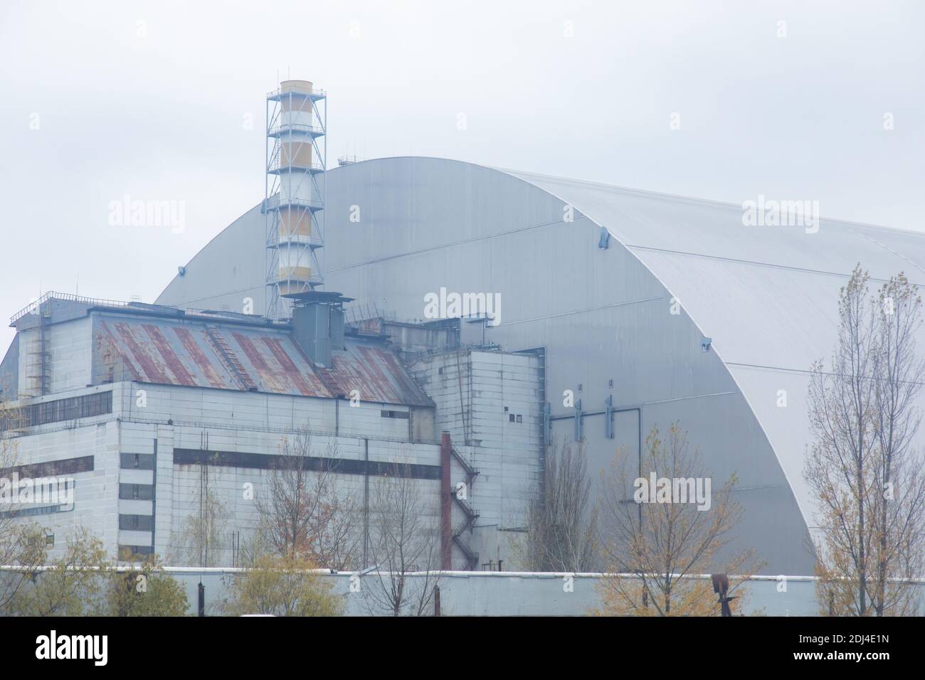 The nuclear power plant, where a protective shelter covers the reactor ...