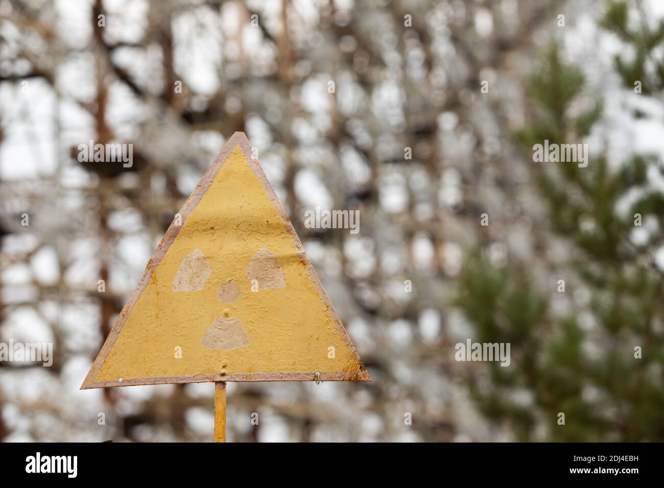 Rusty nuclear hazard sign in front of Duga system, a Soviet over the ...