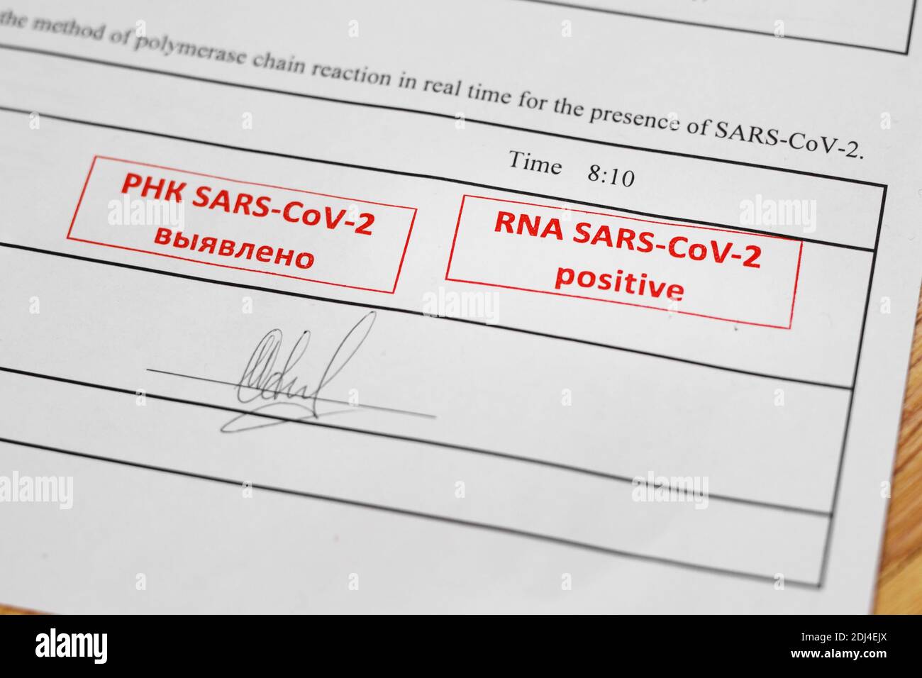 Positive test result for COVID-19 virus. Red stamp on a paper Stock ...