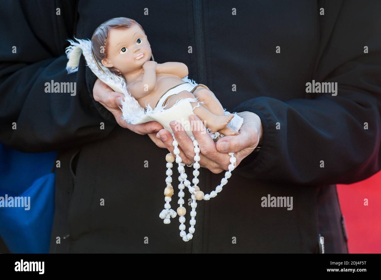 December13, 2020 : A nun holds a baby Jesus figurine in his hand for ...