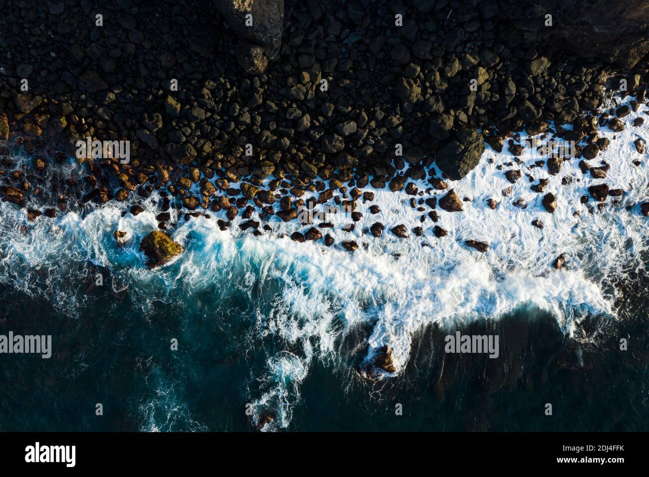 Top down view of the beautiful sea waves coming to the coast, Tenerife ...