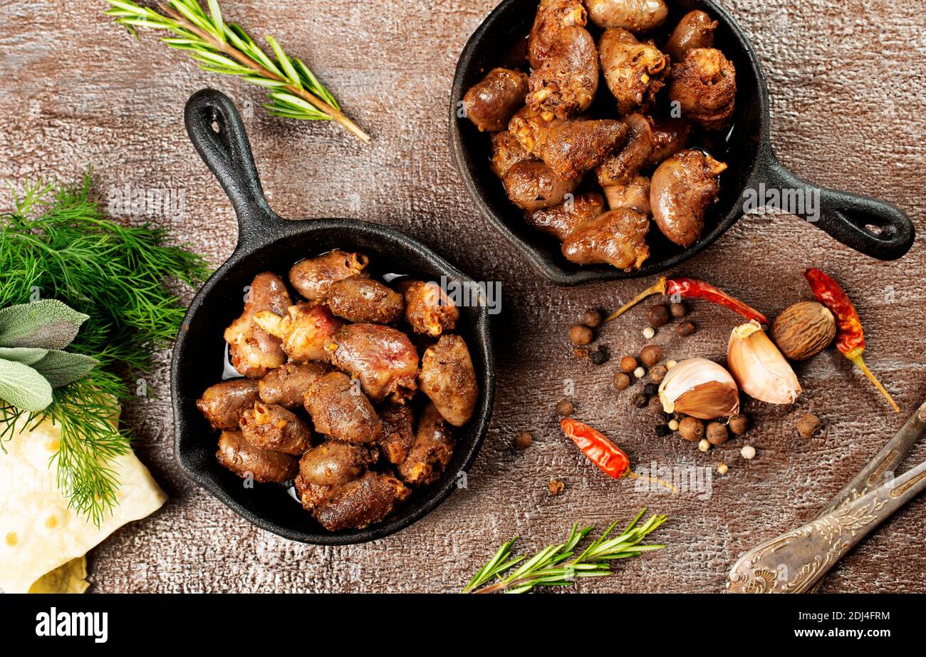 Braised chicken hearts with spice and salt Stock Photo - Alamy