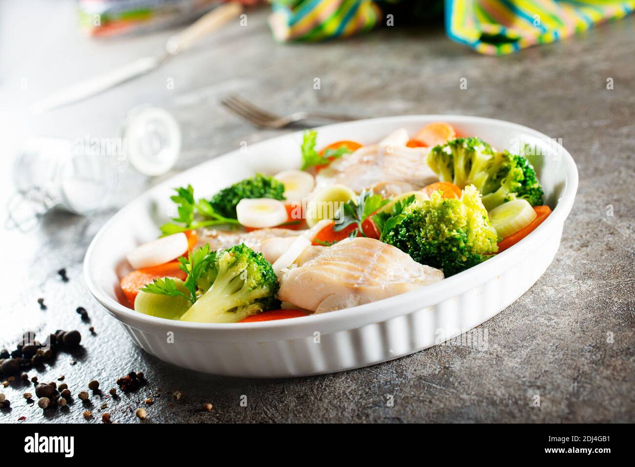 white fish with broccoli and red pepper Stock Photo - Alamy