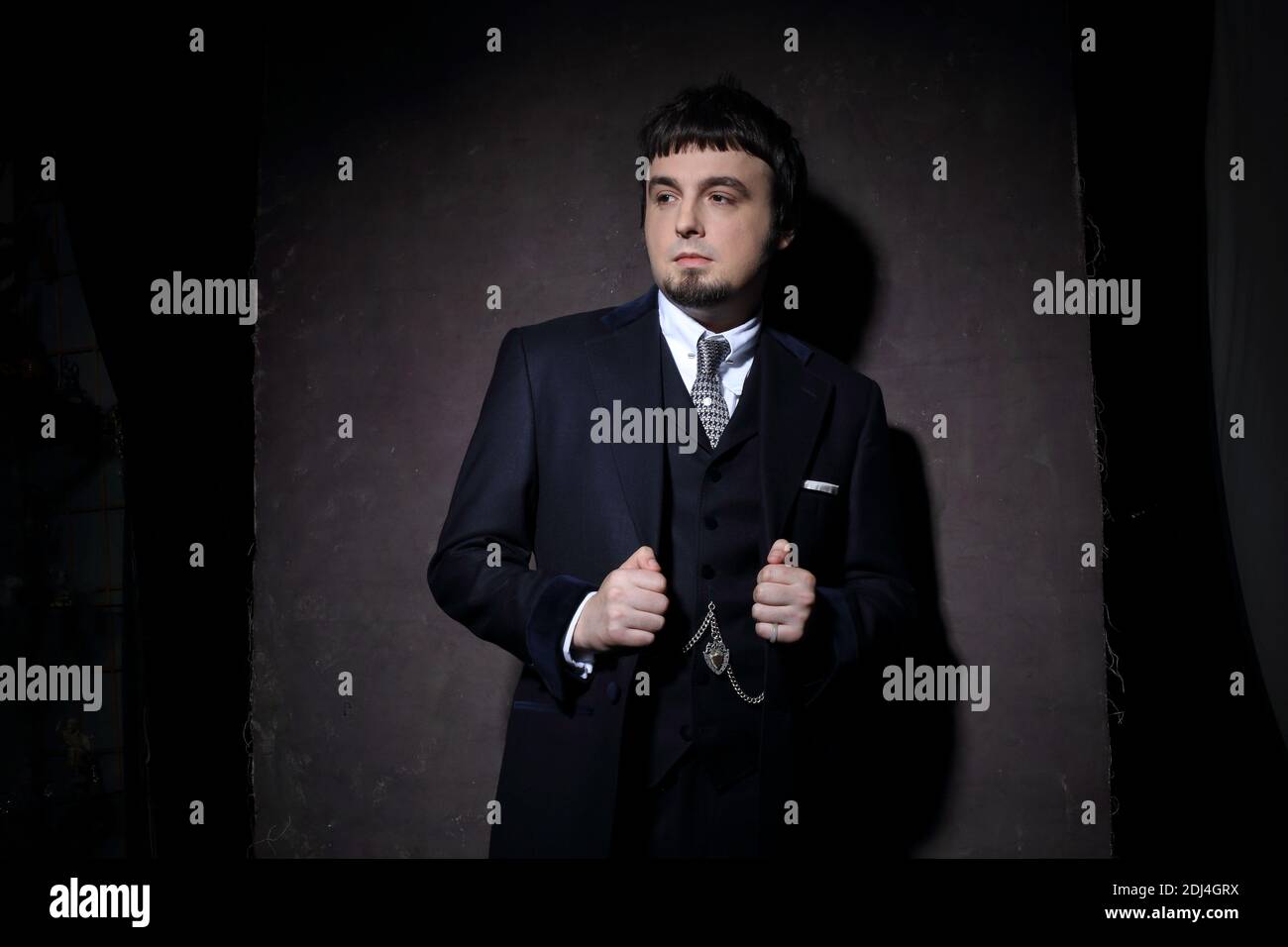 Male wearing teddy boy style three-piece suit Stock Photo - Alamy