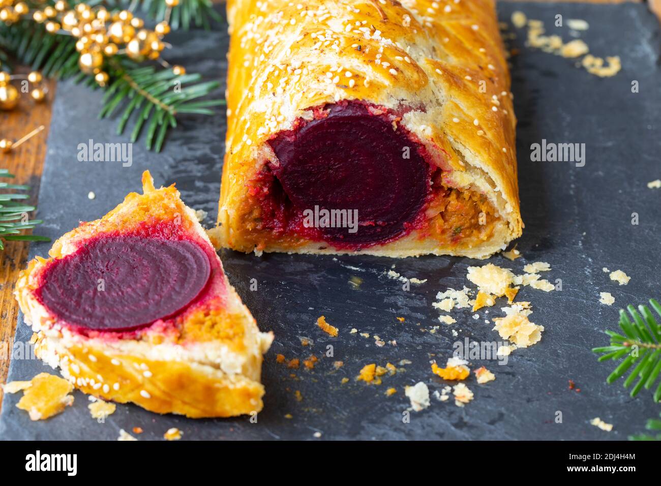 Vegetarian beetroot and butternut squash pie in rough puff pastry Stock ...
