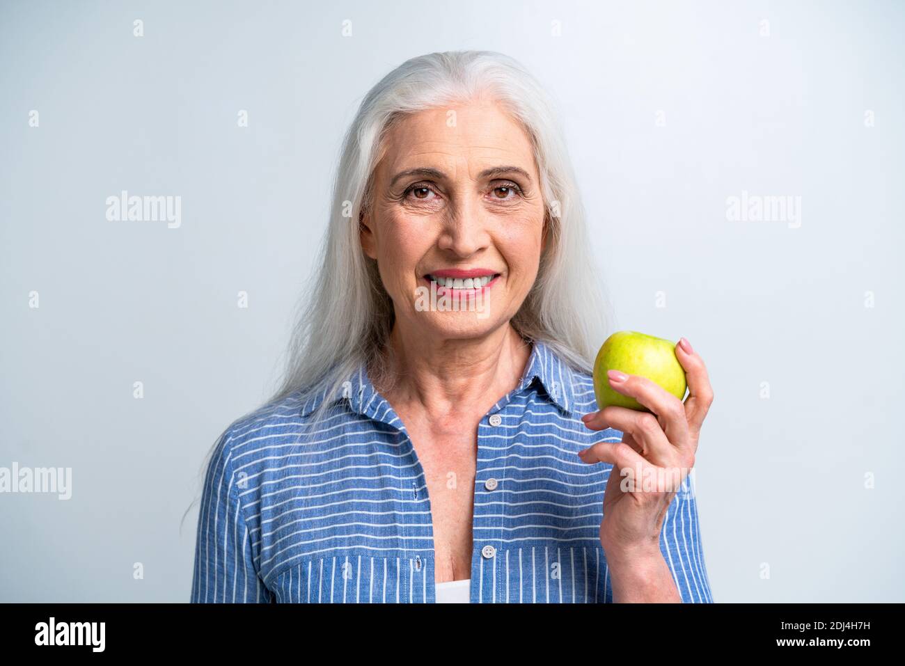 Beautiful senior woman portrait, studio shot on background - Elderly ...