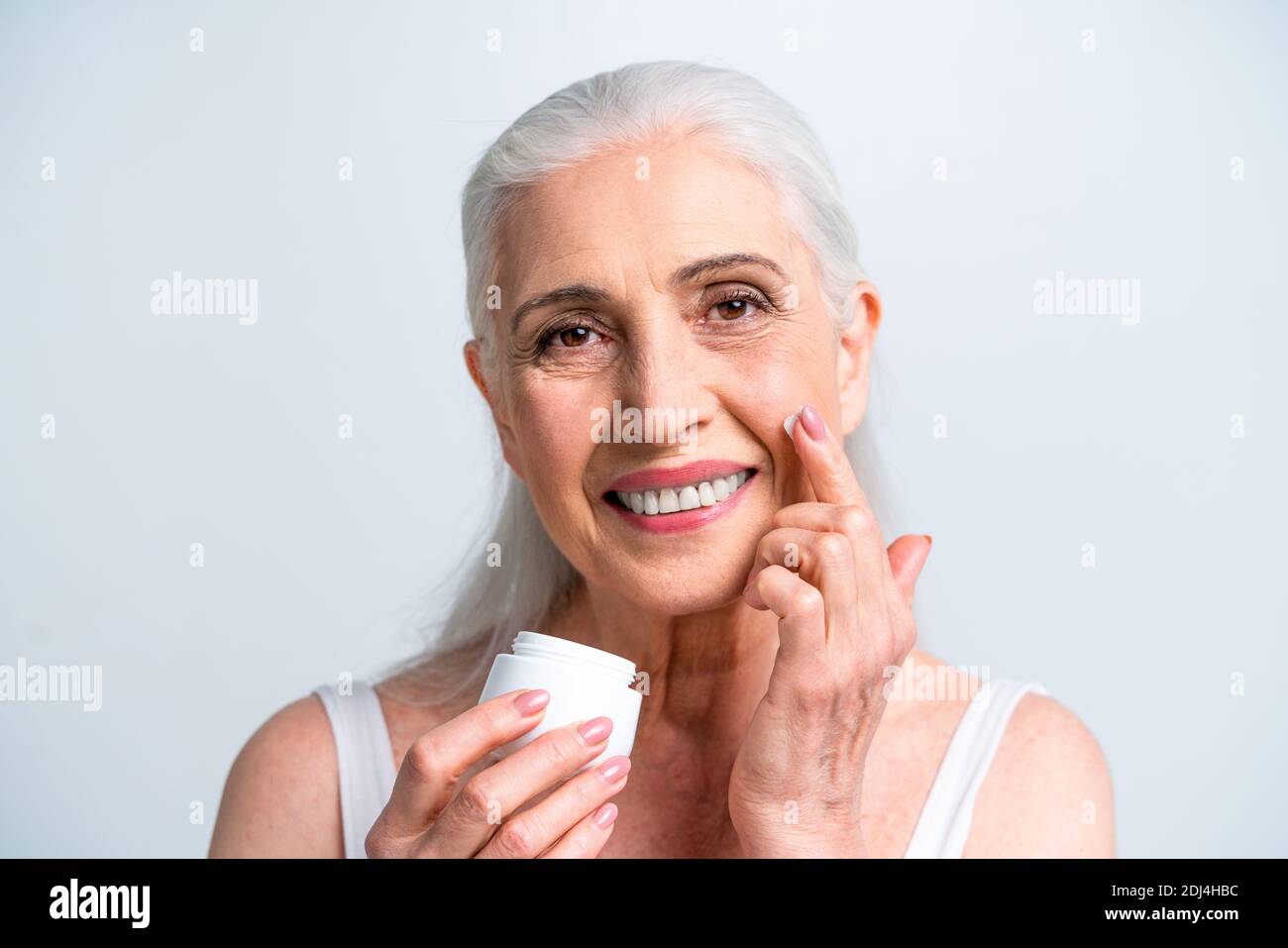 Beautiful senior woman portrait, studio shot on background - Elderly ...