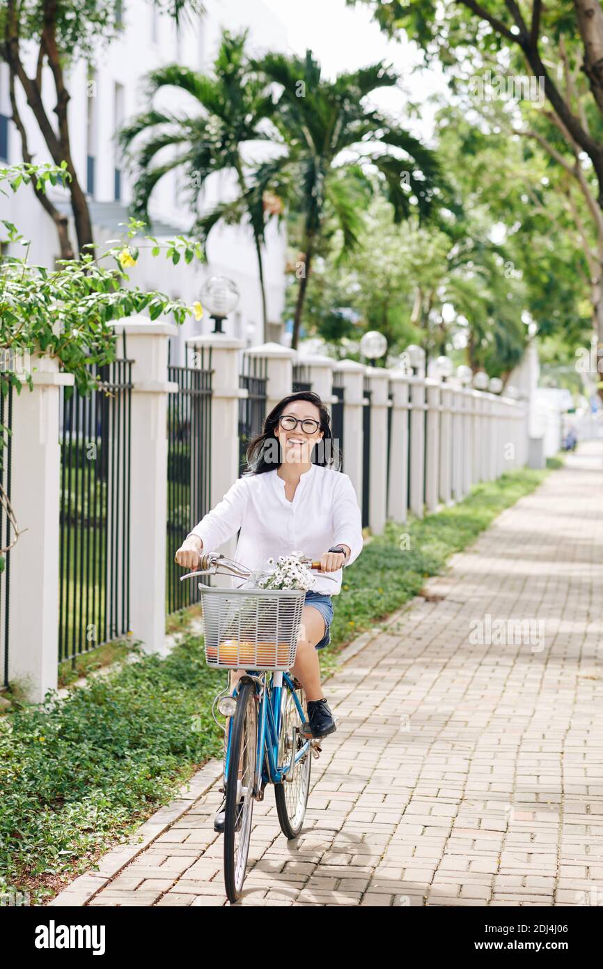 Chinese girl on bicycle hi-res stock photography and images - Alamy