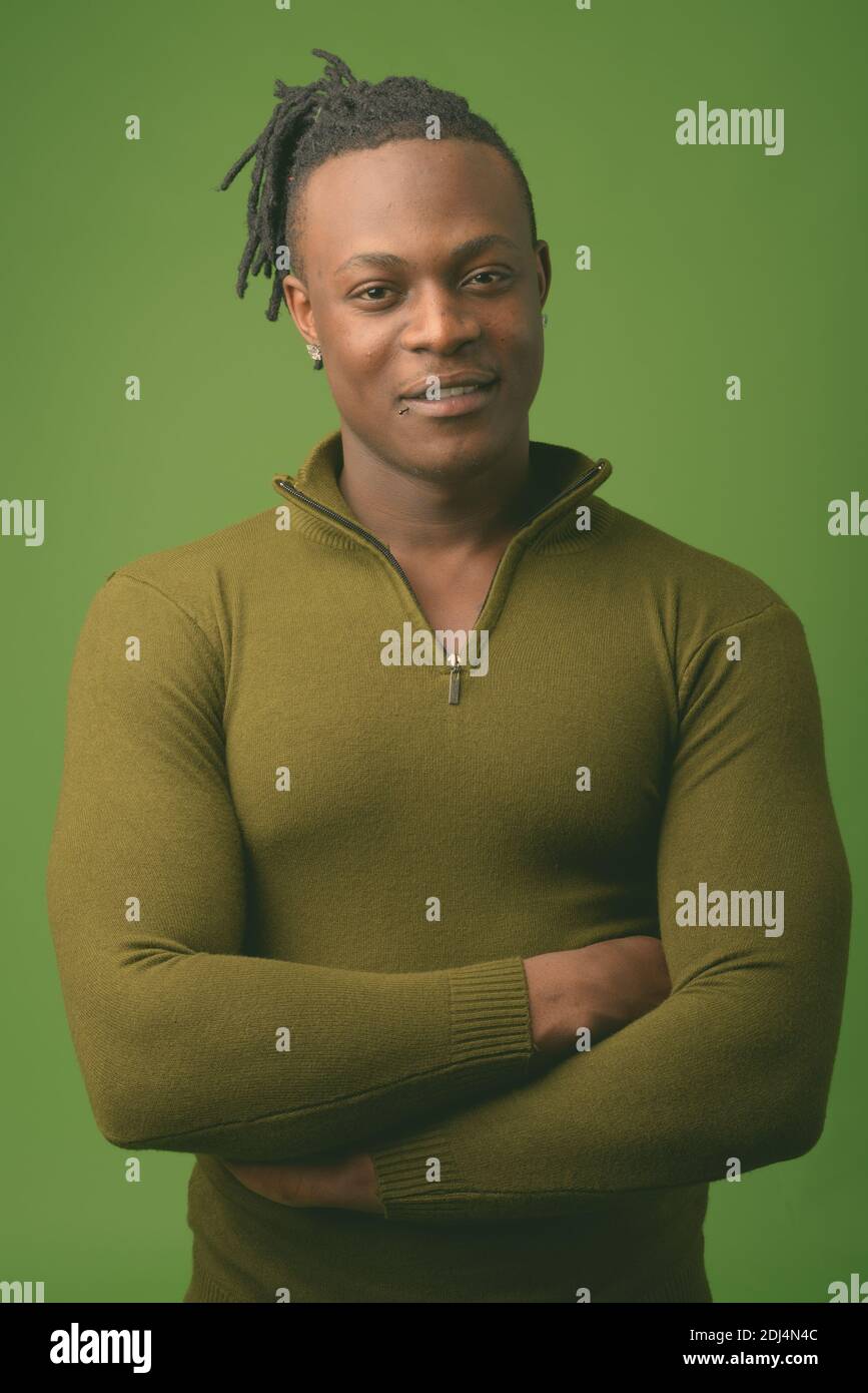 Young handsome African man from Kenya against green background Stock ...
