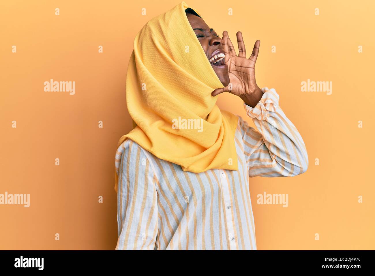 Beautiful african young woman wearing traditional islamic hijab scarf ...